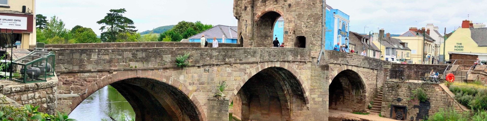 Monnow Bridge is a medieval bridge over the namesake river Monnow in the town of Monmouth, Wales. The existing bridge was completed in the late 13th century. It is the only remaining medieval fortified bridge in Britain.