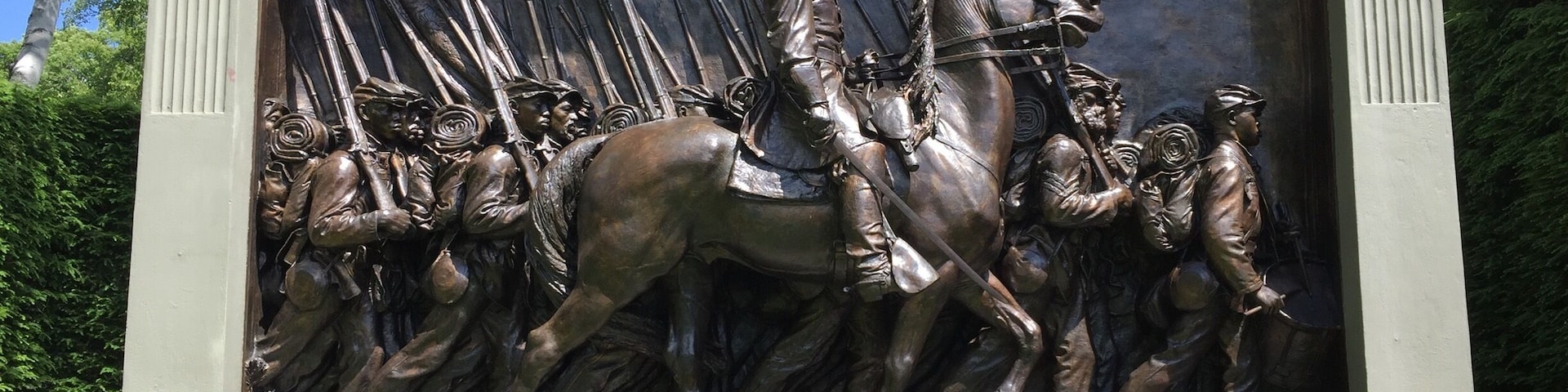 Among Saint-Gauden's most famous  sculptures is the "Shaw Memorial",  a relief bronze sculpture, dedicated to the 54th Massachusetts Regiment - the first Black regiment of the US Civil War.  The first cast is in Boston; this one was cast years later after Augustus continued to refine some aspects of it.