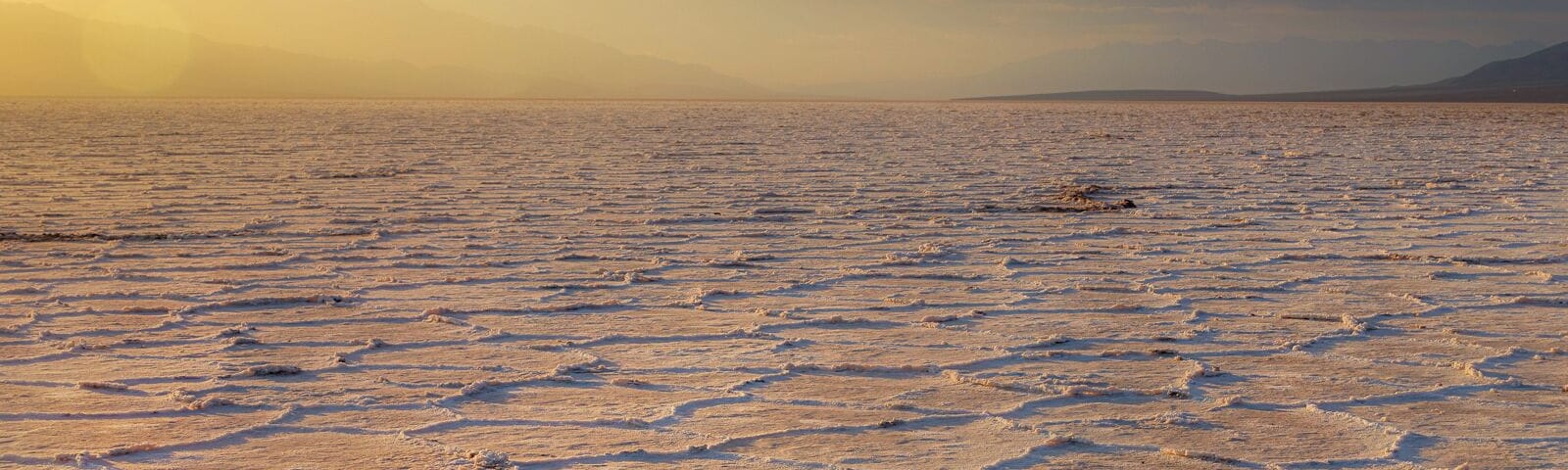 It is really hard to describe what this was like. The basin was super flat and miles long. It has thousands upon thousands of salt features. The heat is just oppressing and I think due to how quiet it is you can actually hear the heat come off the salt.