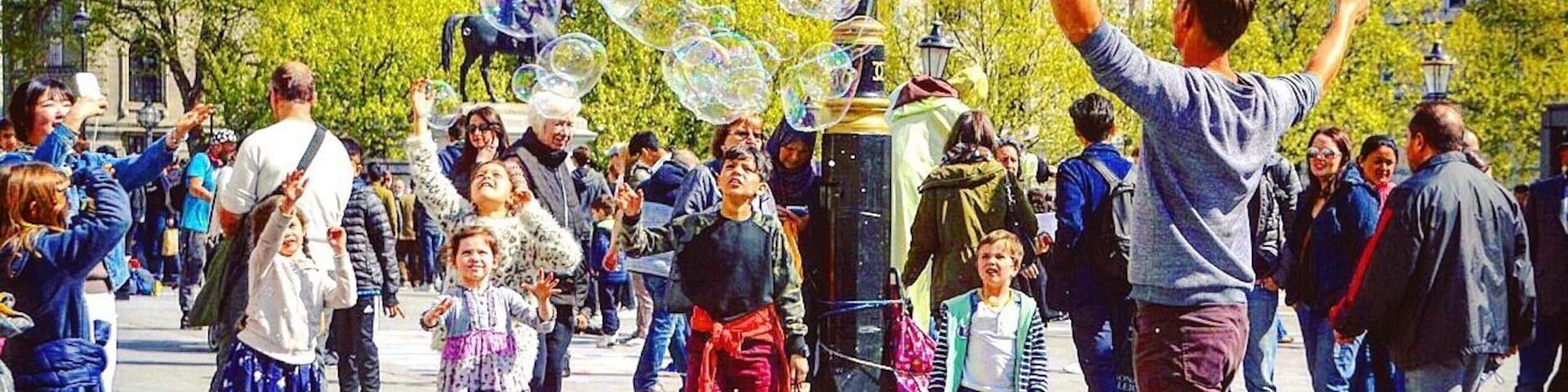 ...Bubbles for travel to Asia. A young traveller bringing smiles to the kids' faces with Bubbles. All tips he's making goes toward getting him to Asia. Just one of the stories on the streets of London.