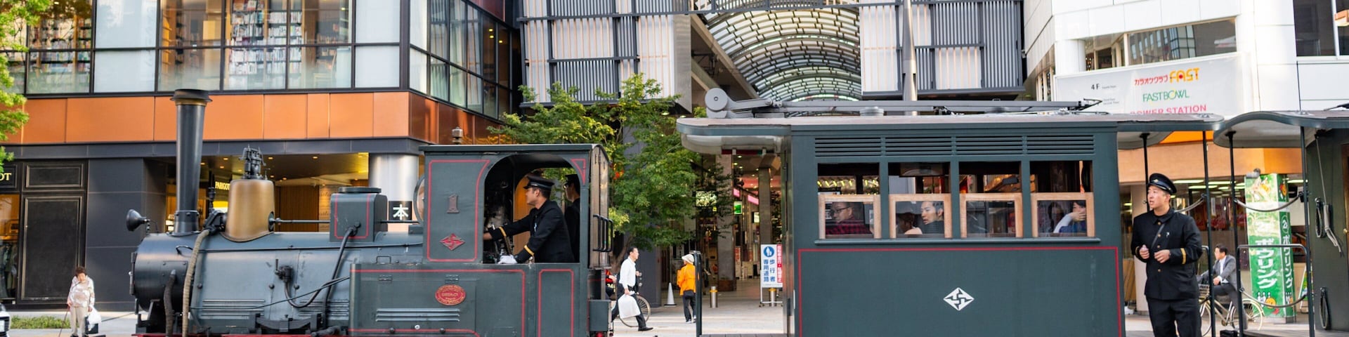 Matsuyama featuring street scenes, heritage elements and railway items