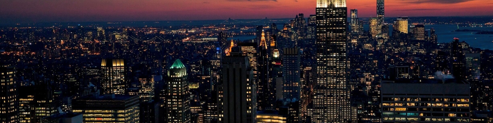 30 Rockefeller Plaza is an Art Deco skyscraper in the middle of Rockefeller Plaza in Manhattan. At 850 feet (260 m) high, the 70-story building is the 14th tallest in New York City and is a great place for capturing views at sunset (especially because it offers views of the Empire State Building).
To get this shot, head to the top of Rockefeller Center, known as "Top of the Rock." The entrance is on W 50th St between 5th and 6th Avenues. Tickets can be purchased on the basement level of building. Be sure to purchase your tickets in advance in order to make your way to the top by sunset (the entry system is timed). Also allot time for a security screening and wait times at the elevator.
Once you arrive at the observation deck take the escalator to the upper levels where your views won't be impeded by the glass windscreens. Tripods are not allowed (although monopods are allowed), but you can rest your camera on the stone barriers of the upper observation deck. Additionally you can use a table-top tripod for stability.
#StunningStructures
#UrbanJungle