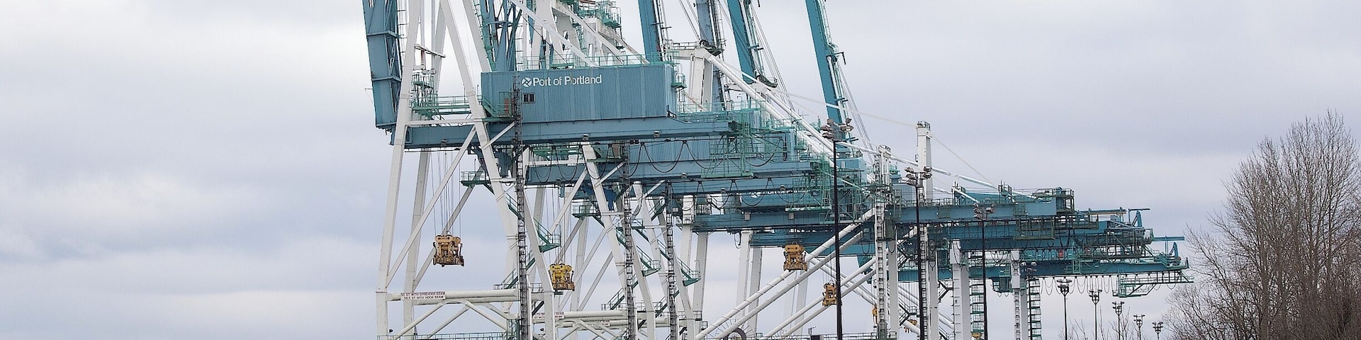 These massive cranes service the terminal area of the Port of Portland in the northern-most section of the city.
If we assume that one of those pilot boats is approximately 12 feet tall, we can calculate an approximate height for the cranes behind it -- something on the order of 120 feet.
You can see this structure at the northeastern-most portion of Kelley Point Park.
