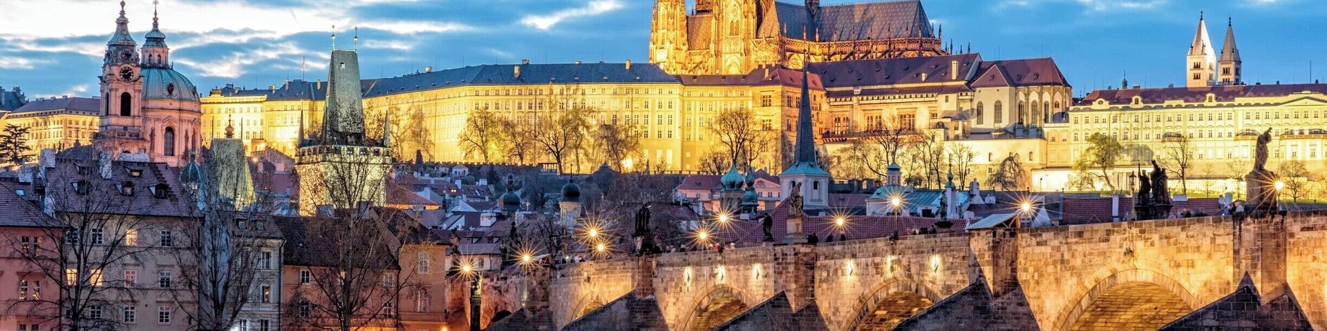 My twilight image of the Charles Bridge with St Vitus Cathedral in the background of Old Town Prague. Prague is magical at twilight.