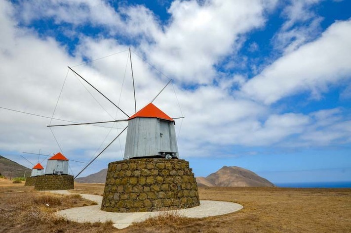 Three preserved windmills standing proud on Porto Santo Island.