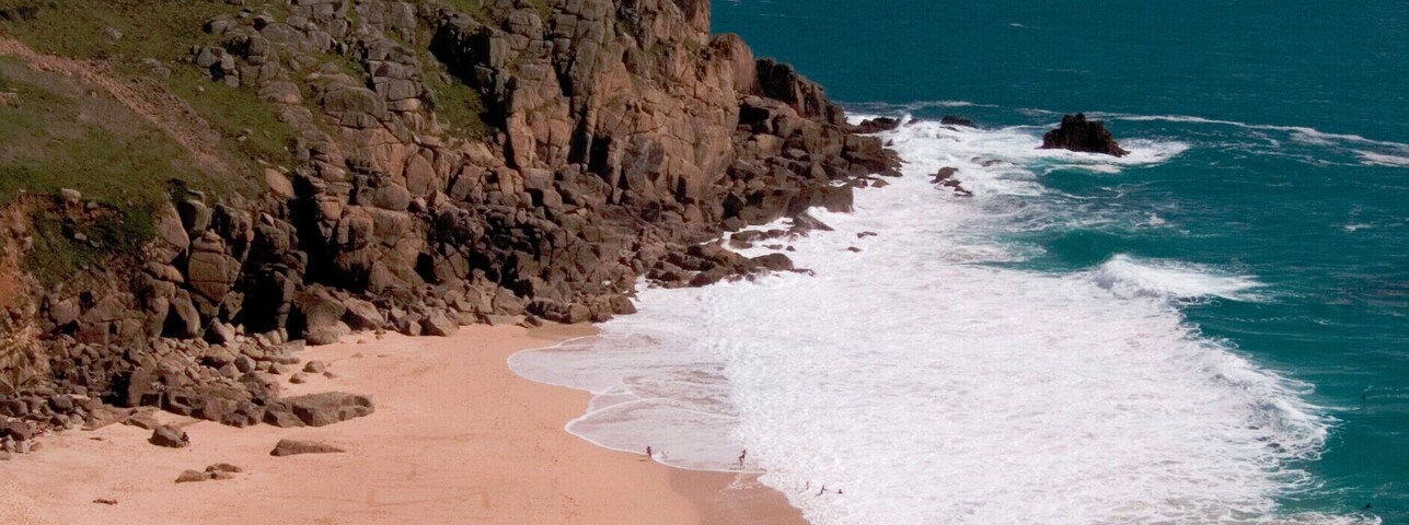 The beautiful but difficult to climb down to beach at Porthchapel has now (May 2018) been sadly been swept clean of all the sand in this image by the winter storms, leaving only rocks. From this photo I estimate that a depth of 3 metres of sand has been washed away.