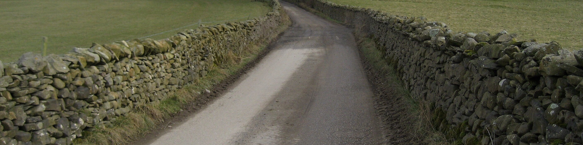 Access Lane from Ireby Hall Farm Lane that gives exclusive access from Ireby Hall Farm to the A65.