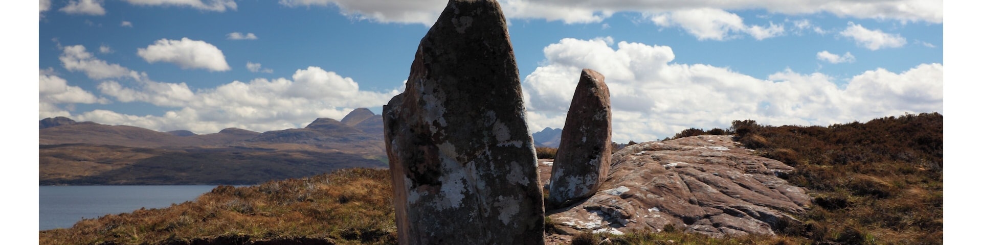 the ancient monoliths that guard the highland mountains