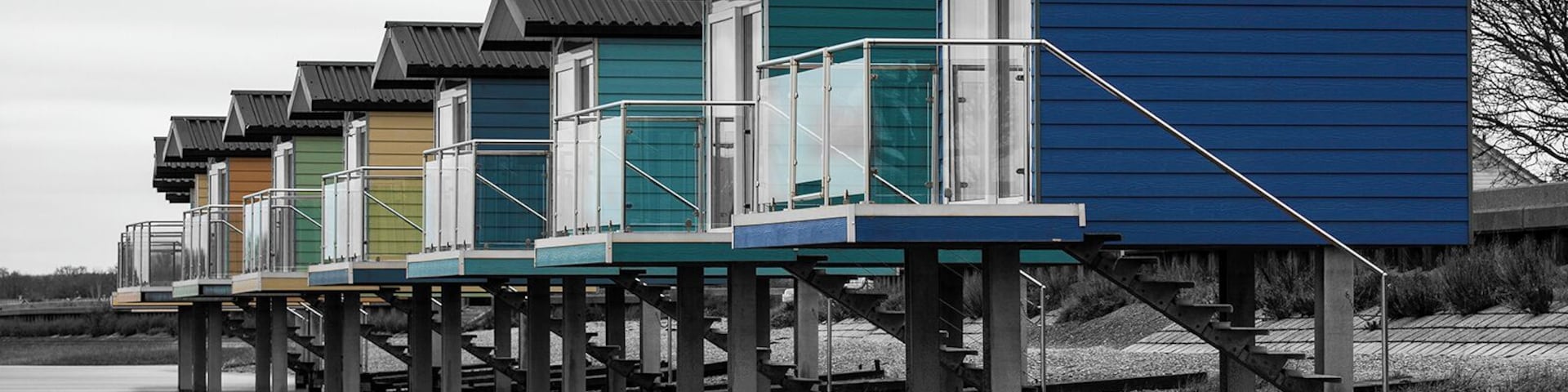 Uninteresting weather conditions, so waded out into the sea for a long exposure and to highlight the colours of the beach huts.