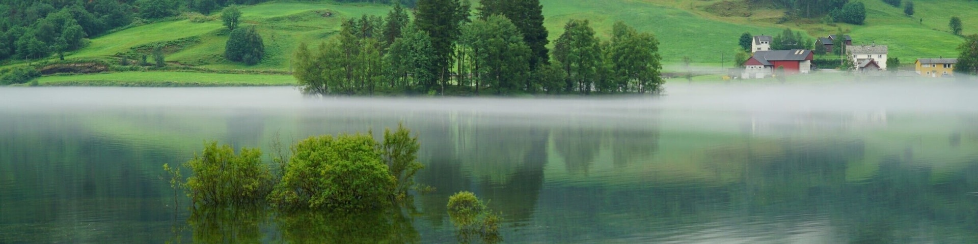 Just a little east of Vossevangen on the road to Bergen. The timing was just right to see this beautiful scene.