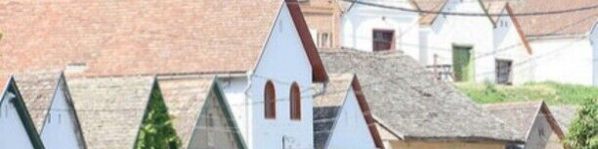 Villánykövesd is a small village near Pécs, famous for its two rows of wine cellers. (The red wine of the area Villány is concidered one of the best in Hungary.)