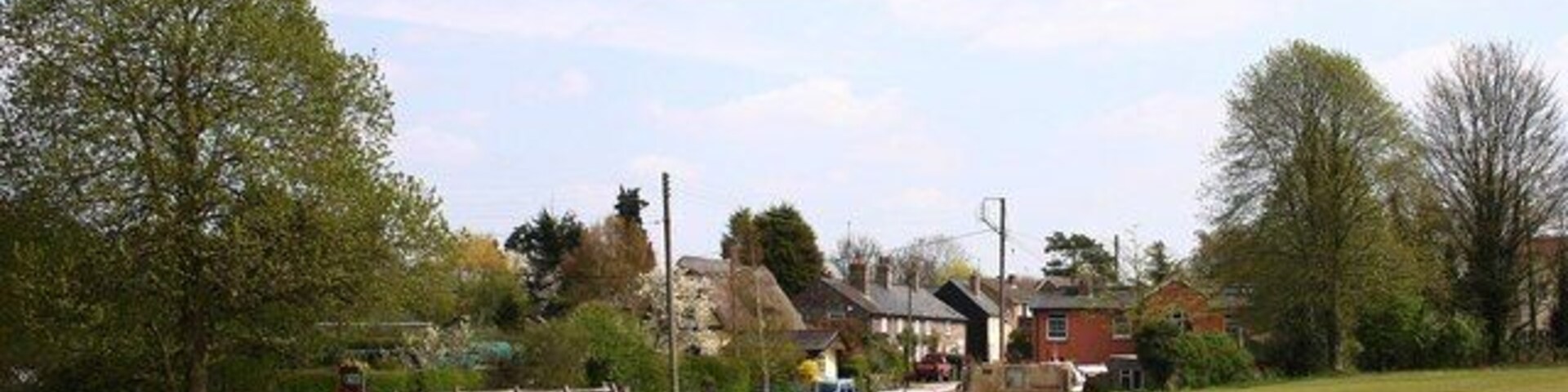 Horseheath, near to Horseheath, Cambridgeshire, Great Britain. The cottages are in Haverhill Road. Taken from the footpath that runs beside the cricket pitch.