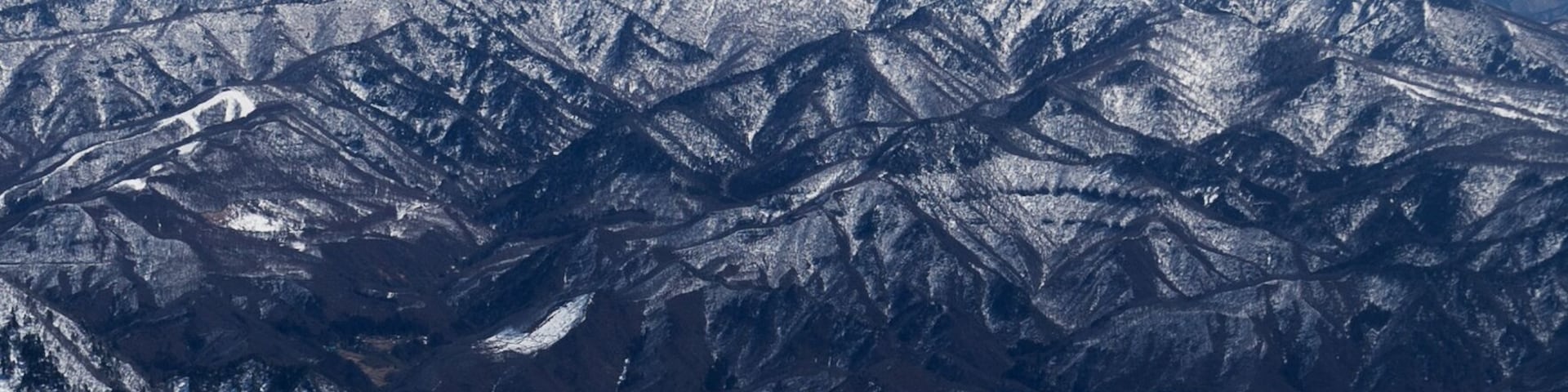 This is a retouched picture, which means that it has been digitally altered from its original version. Modifications: 3:2 Cropping &Color adjustment. The original can be viewed here: Mount Hotaka from Mount Tanigawa 2016-03-26.jpg. Modifications made by Batholith.