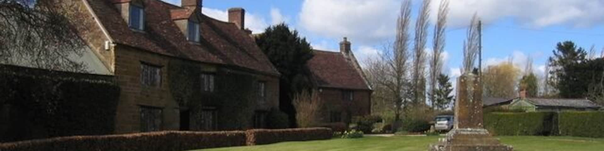 Church End, Priors Hardwick Another view of the houses beside the green and war memorial.
