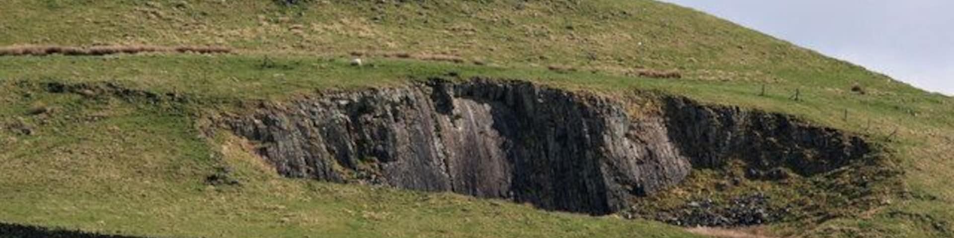 Southdean Law Quarry on the side of Southdean Law.
