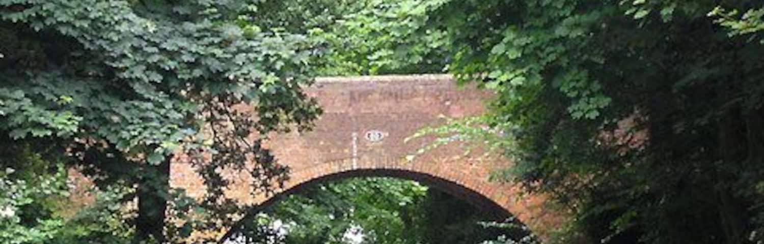 Bridge No 60, Trent and Mersey Canal at Armitage, Staffordshire A public footpath crosses the bridge onto the towpath, then a short distance to the west crosses northwards under the railway to a river bridge. At this point it meets with the recreational footpath known as "The Way for the Millennium", information about which can be read here: http://www.staffordshire.gov.uk/environment/e-land/RightsofWay/PromotedRoutes/ROWPromotedRouteMillennium.htm