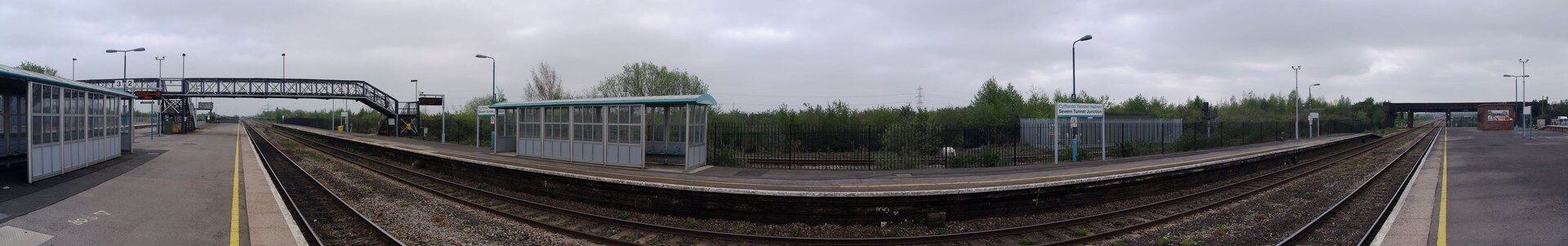 Panorama of platforms 1 and 2 at Severn Tunnel Junction railway station. The left hand side is towards Gloucester, the right towards Newport.