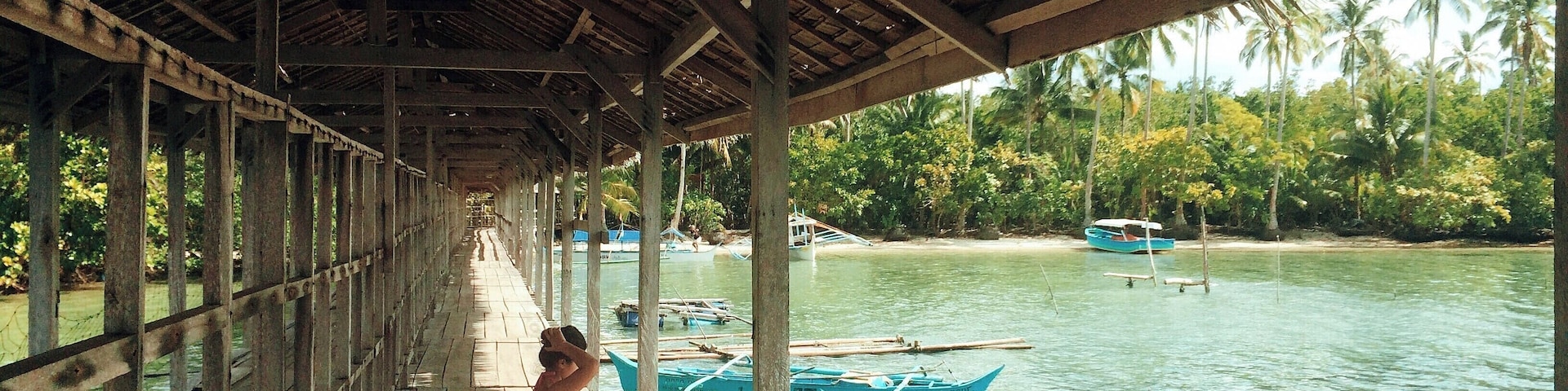 This long dock leads to the resort and passes over mangroves on the island. It's perfect to just sit and enjoy the sunshine. #BeachTips
More photos, a guide, and tips for this destination here:
http://artbeatsmath.com/surigao-siargao