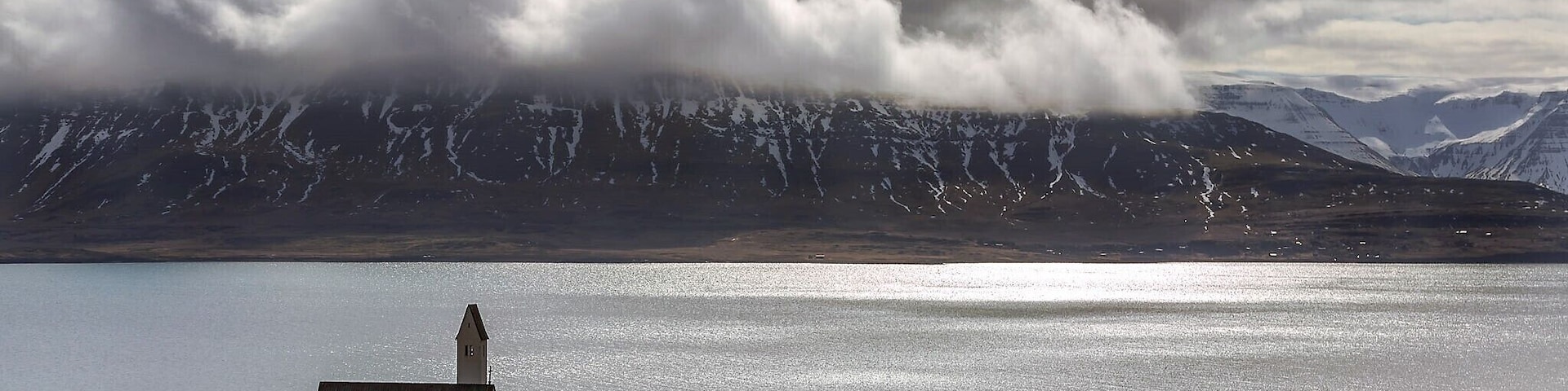 I love those little local churches set off of the maun road fro Reyjavic on the road South. I was struck by the "layers" and interseting cloud formation
