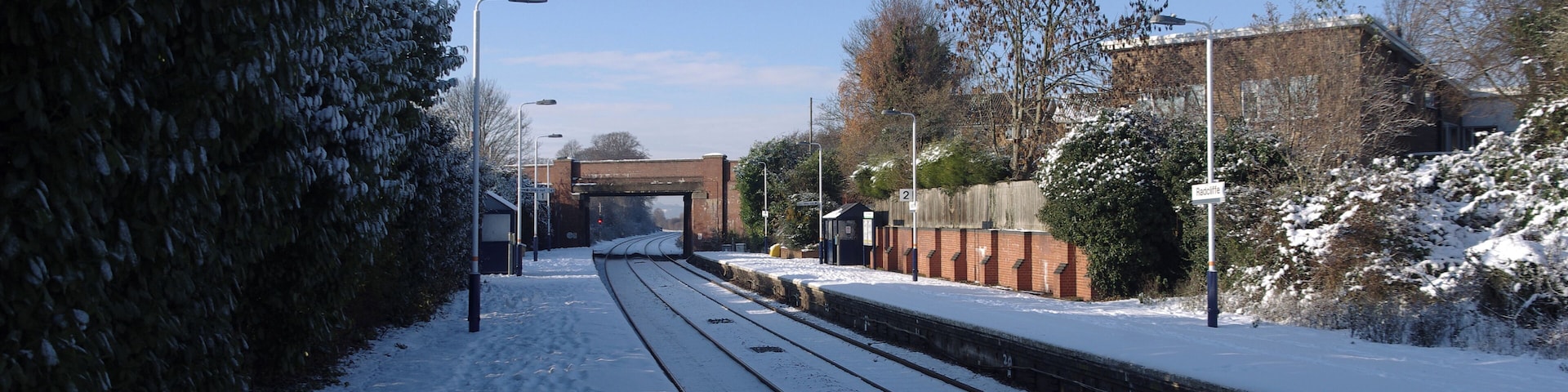 Radcliffe railway station in the snow - looking west along the westbound platform.
