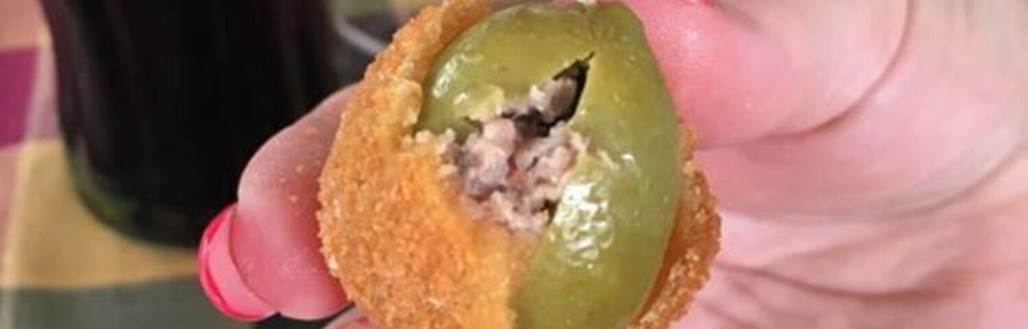 Oh my!....my tastebuds are doing the can can! Warm stuffed olives in breadcrumbs! #FoodieFinds