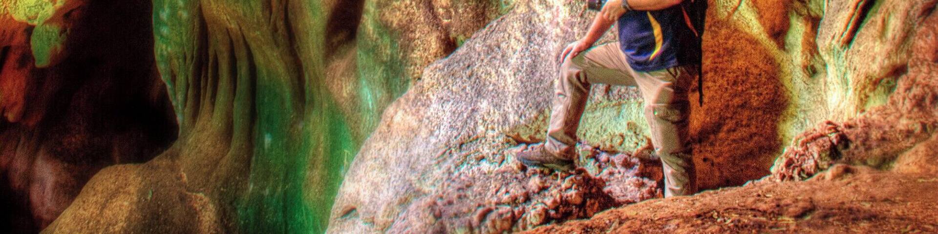 Bassin Zim, little-known treasure of Haiti, sits along Central Plateau, eight kilometers away from Hinche. It contains waterfalls, coves, and caves. The falls tumble down in white-clouded streams to four azure coves below: Candelabra, Arc-en-ciel, Bassin Zim, and Wells. Implanted within each cove are colonies of caves lined with mineral rocks. Some contain artwork by indigenous Taino Indians before immigration and colonization began. Considered a spiritual oasis for seekers of nirvana, it is rumored healing here manifests later in positive events in believers' lives. Those who can weather the daunting trek to Bassin Zim are rewarded by an almost unearthly scene of beauty.