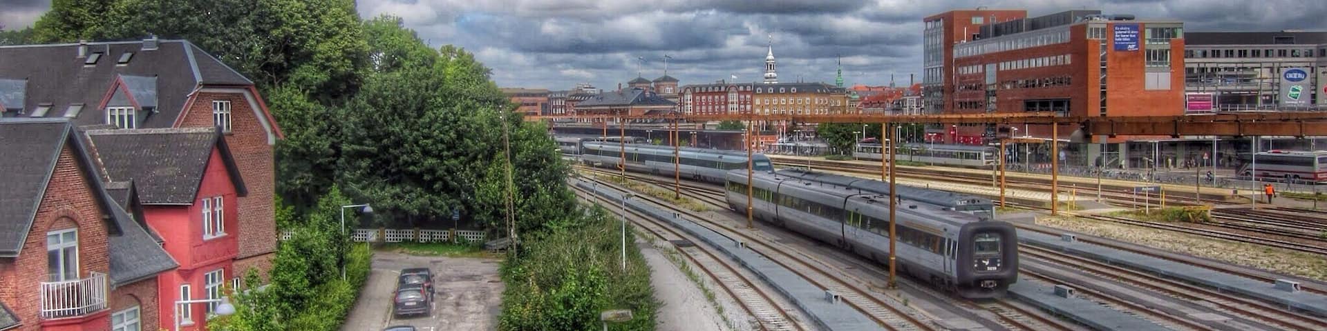 Aalborg station opened in 1869 (Danish: Aalborg Banegård) is serving as a connecting hub for rail traffic between North Jutland and the rest of Denmark.
Aalborg (or Ålborg) is an industrial and university city in the North of Jutland, Denmark. The earliest settlements date to around AD 700.