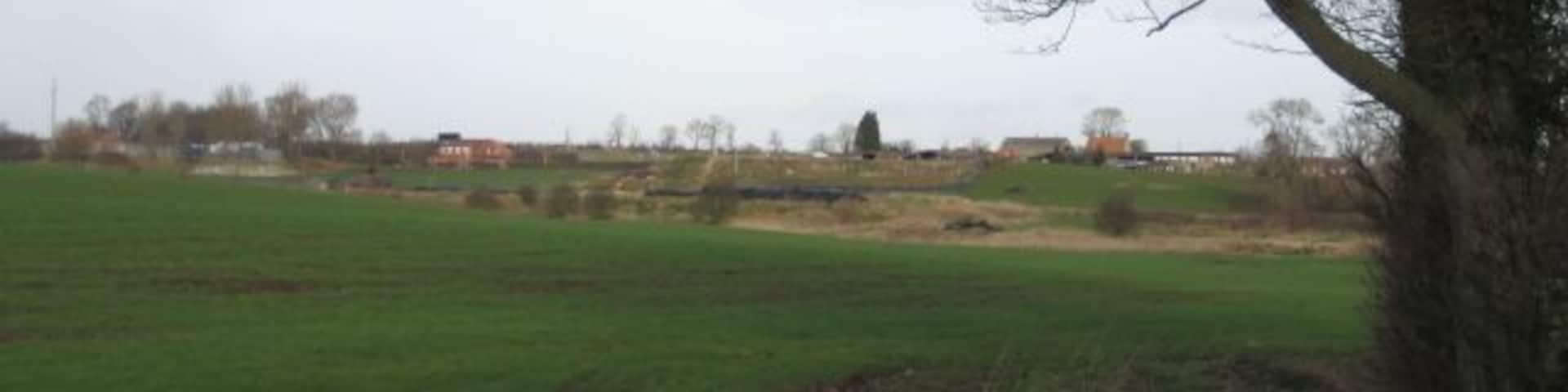 View towards Grafton Grange Taken from the lane linking Marton cum Grafton to the A168 which runs along the ridge seen in the distance.