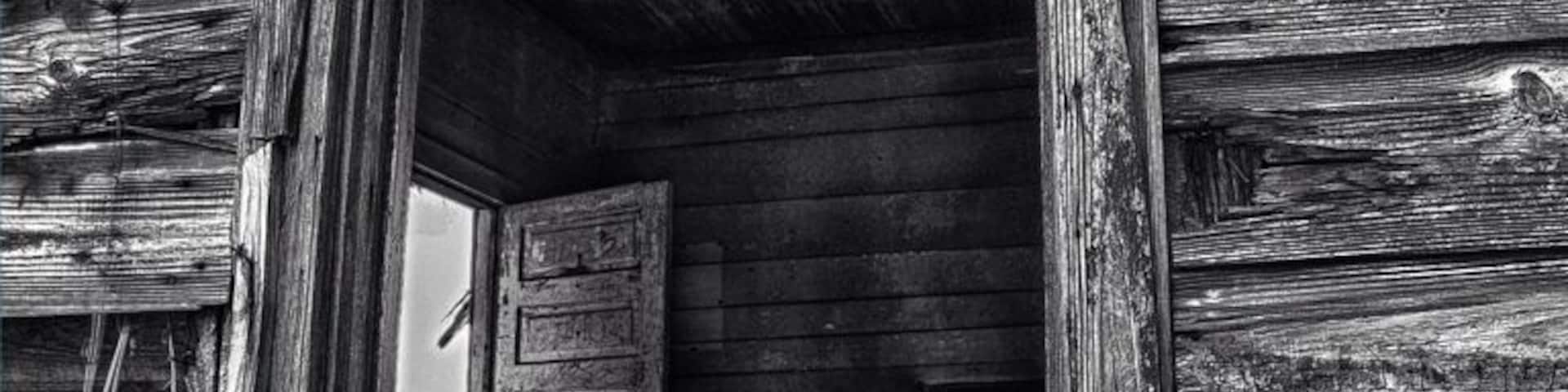 If you like old, abandoned, Erie, and probably ghost filled houses this one is a winner. There was an old bed half hanging out a window on the other side. The recliner was the only thing in this room other then the fireplace. I did not go in, yes I was afraid.