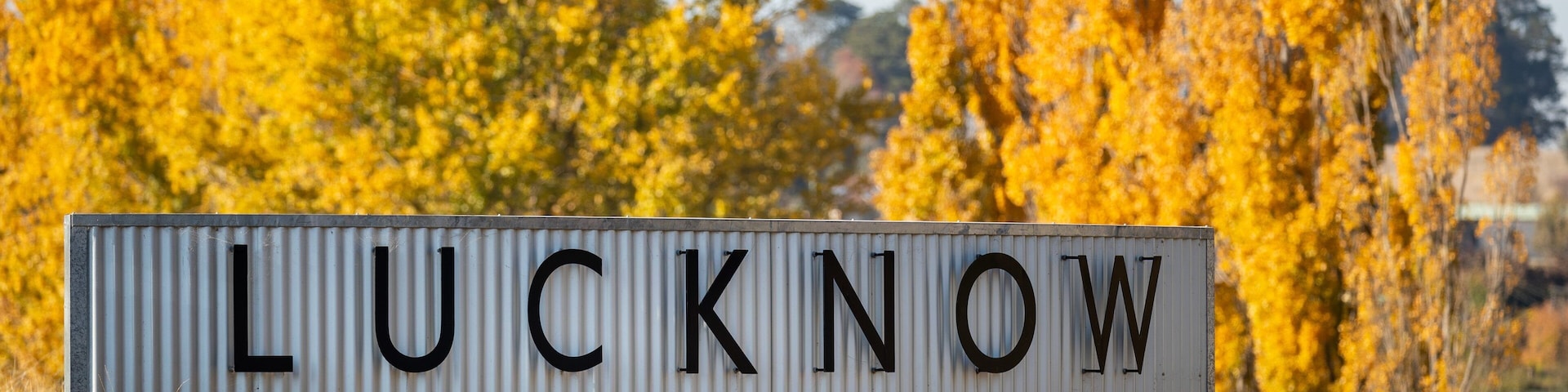 Lucknow which includes signage and tranquil scenes