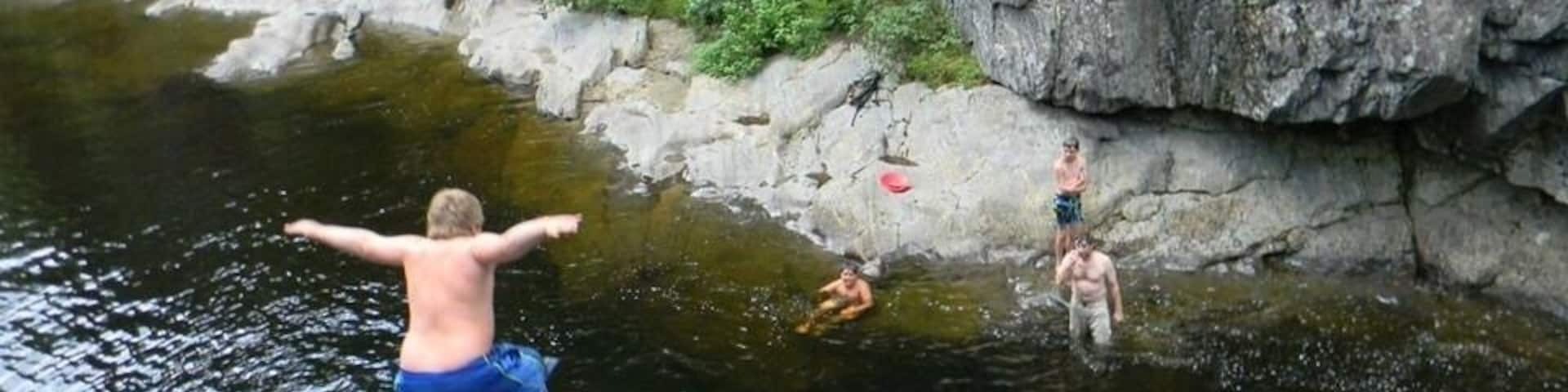 Swimming at the ledges of Lower Coos Canyon on the Swift River of Western Maine.