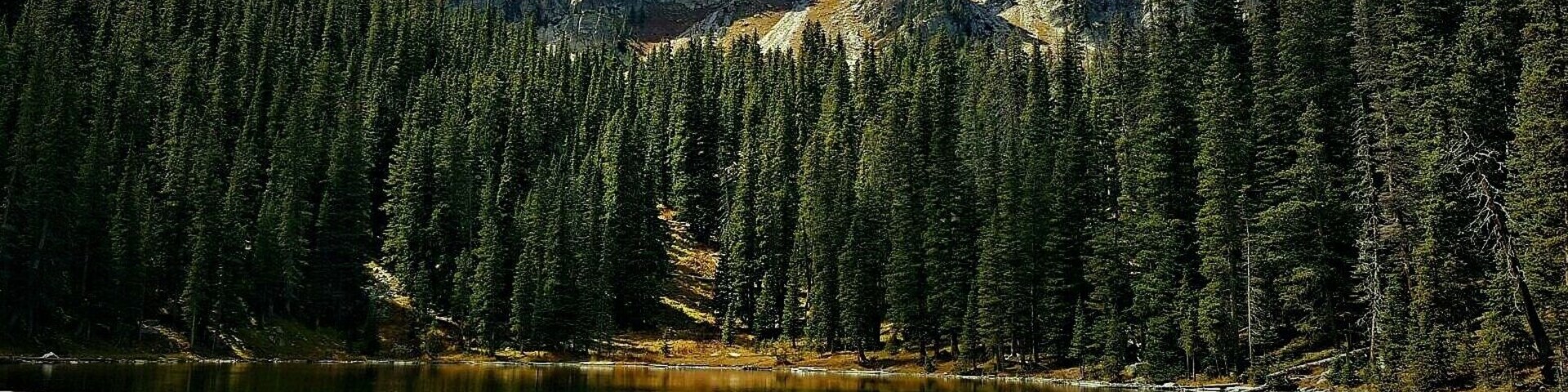 The first Trampas Lake, a beautiful alpine lake group in Northern New Mexico, situated in rising peaks of the southern most park of the Rocky Mountains.