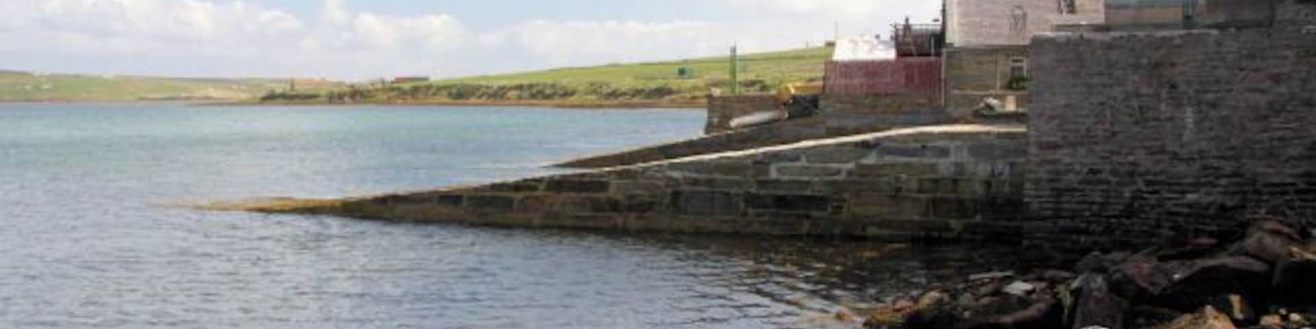 Slipway at St Margaret's Hope The slipway is used by local small fishing boats.