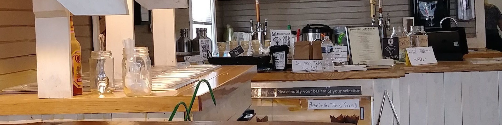 Great coffee shop in the Plains. 
Also has a bike shop inside.
Everything here is also gluten free, including soups, sandwiches, etc.