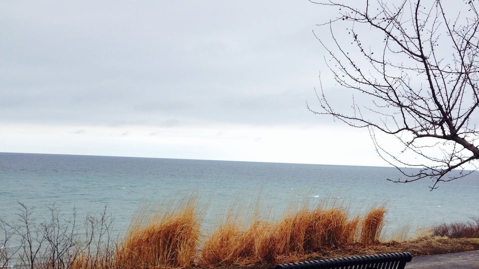 Early spring in Milwaukee , cold and windy . Lake Michigan is beautiful in every season.