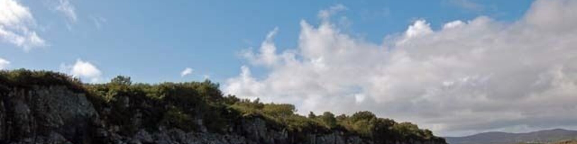 Sea kayaking along the Ulva shoreline Heading out on a four day sea kayak expedition from Ulva Ferry.