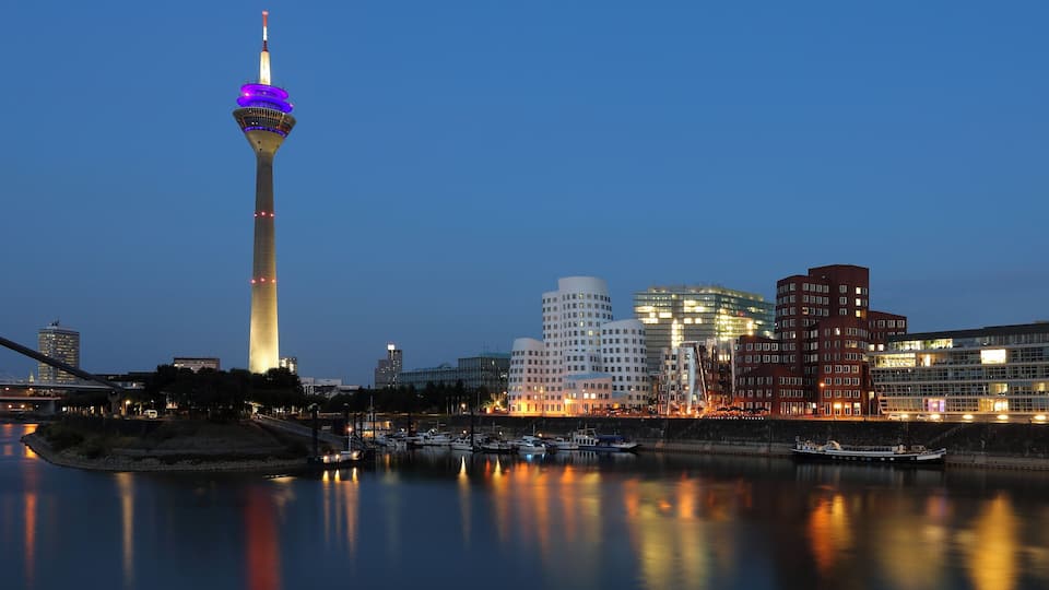 Düsseldorf: panorama of Neuer Zollhof and Rheinturm at blue hour