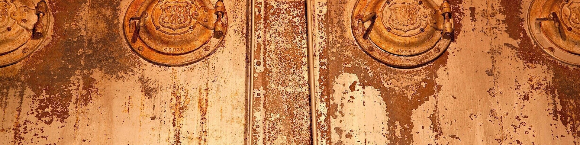 Seattle Electric Company branding can still be found on some of the large boilers at this 1906 power plant. The boilers produced enough steam to turn three Curtis Steam Turbines located in the adjacent room, generating up to 21K kilowatts.
The Georgetown Steam Plant was built in 1906 to provide power for Seattle's streetcars, the city of Georgetown, and the Seattle-Tacoma Railway. Although the turbines were state-of-the art for their time, the technology was advancing so quickly that the plant became outdated within 10 years. It was soon relegated to secondary status and was used occasionally through the 1970s during droughts and to meet peak power demand.
Today, the nearly-complete plant is operated as a free museum and is open to the public the second Saturday of every month from 10am-2pm.