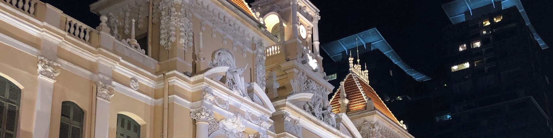 The City Hall in Ho Chi Minh lit up at night.