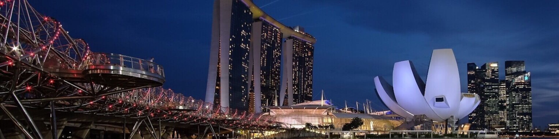 Taken from the walking path at the base of the Helix Bridge. You can get a great view of the bridge, Marina Bay sands and the artscience building as well as a bit of downtown.