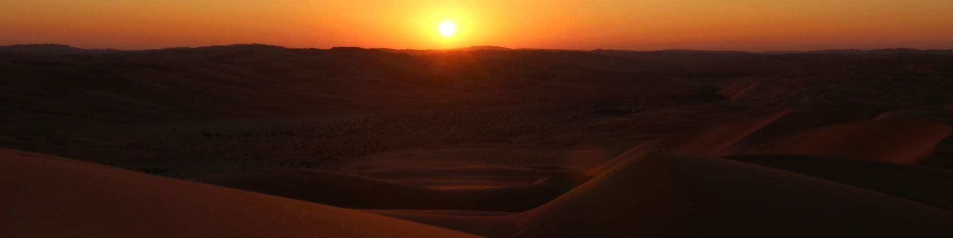 A special sunset in the Liwa Desert, on the northern edge of Rub Al’ Khali (The Empty Quarter), the world’s largest uninterrupted sand desert. 
I climbed a high sand dune and was treated to an extraordinary sight. Seated on the cushion that was the soft fine sand, I looked out at the iridescent sand dunes that stretched out far and wide, and watched in awe as the bright beautiful sun finally disappeared into the horizon.
http://www.spillingthebeans-ng.com/explore-the-elements
#troveon #abudhabi #uae #goldenhour #hiking #bestof5