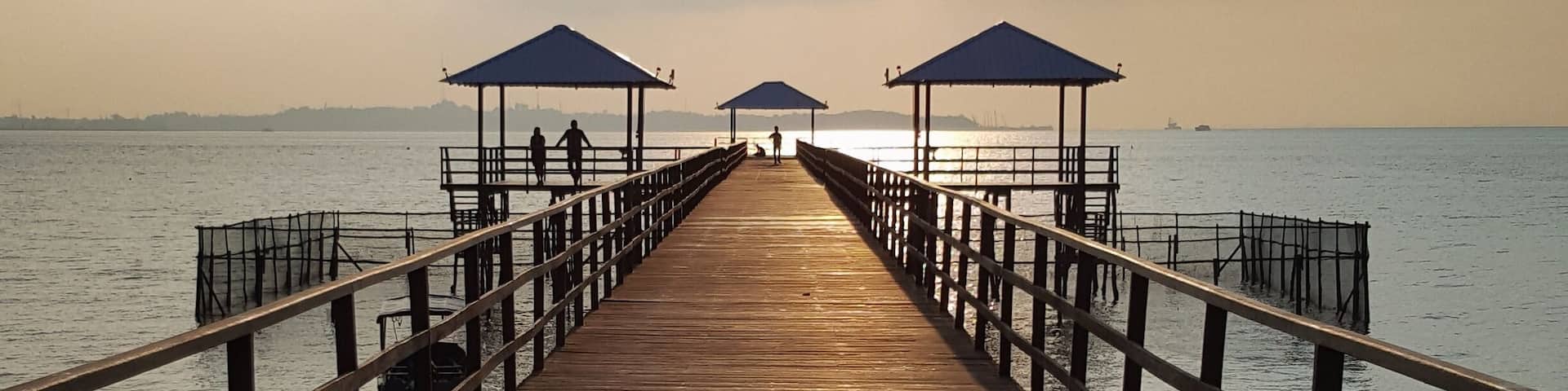 Symmetrical jetty leads out from the resort.