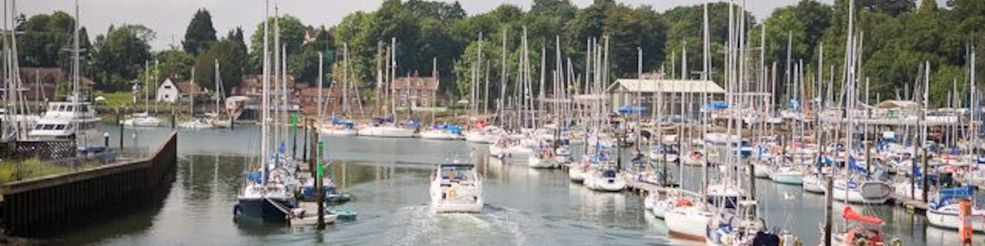 River Hamble SW of Bursledon Bridge Seen from the bridge. Deacons boatyard is on the right.
