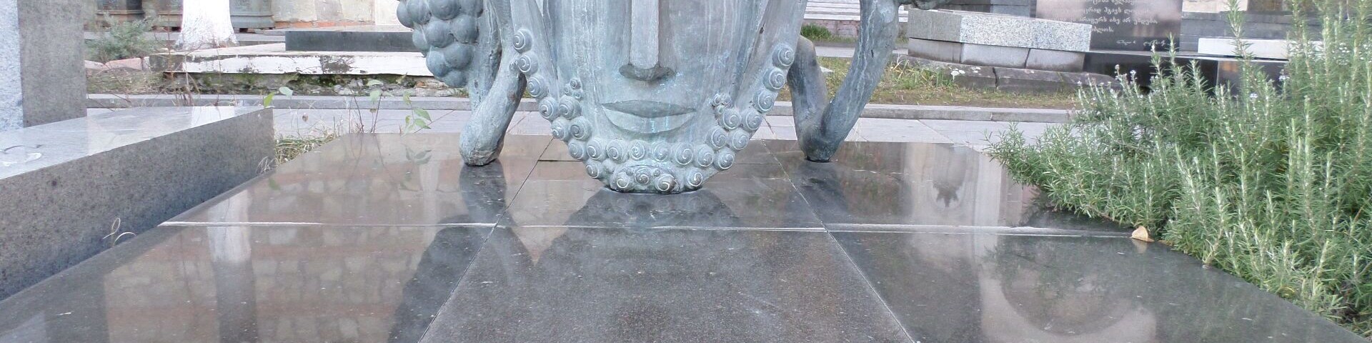 The grave of a Soviet-era actor named Sergo Zakariadze. This picture was taken at a place called the Mtatsminda Pantheon in the city of Tbilisi, Georgia.
The Mtatsminda Pantheon is a graveyard for historical figures in Georgian history - this graveyard is located in the courtyard of a church that has a scenic outlook over the entire city of Tbilisi.