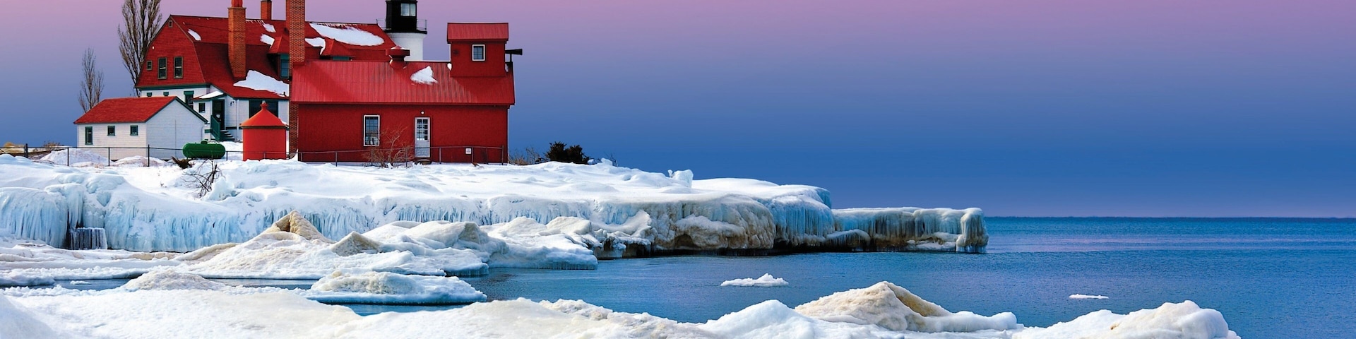 Traverse City showing general coastal views, a lighthouse and snow
