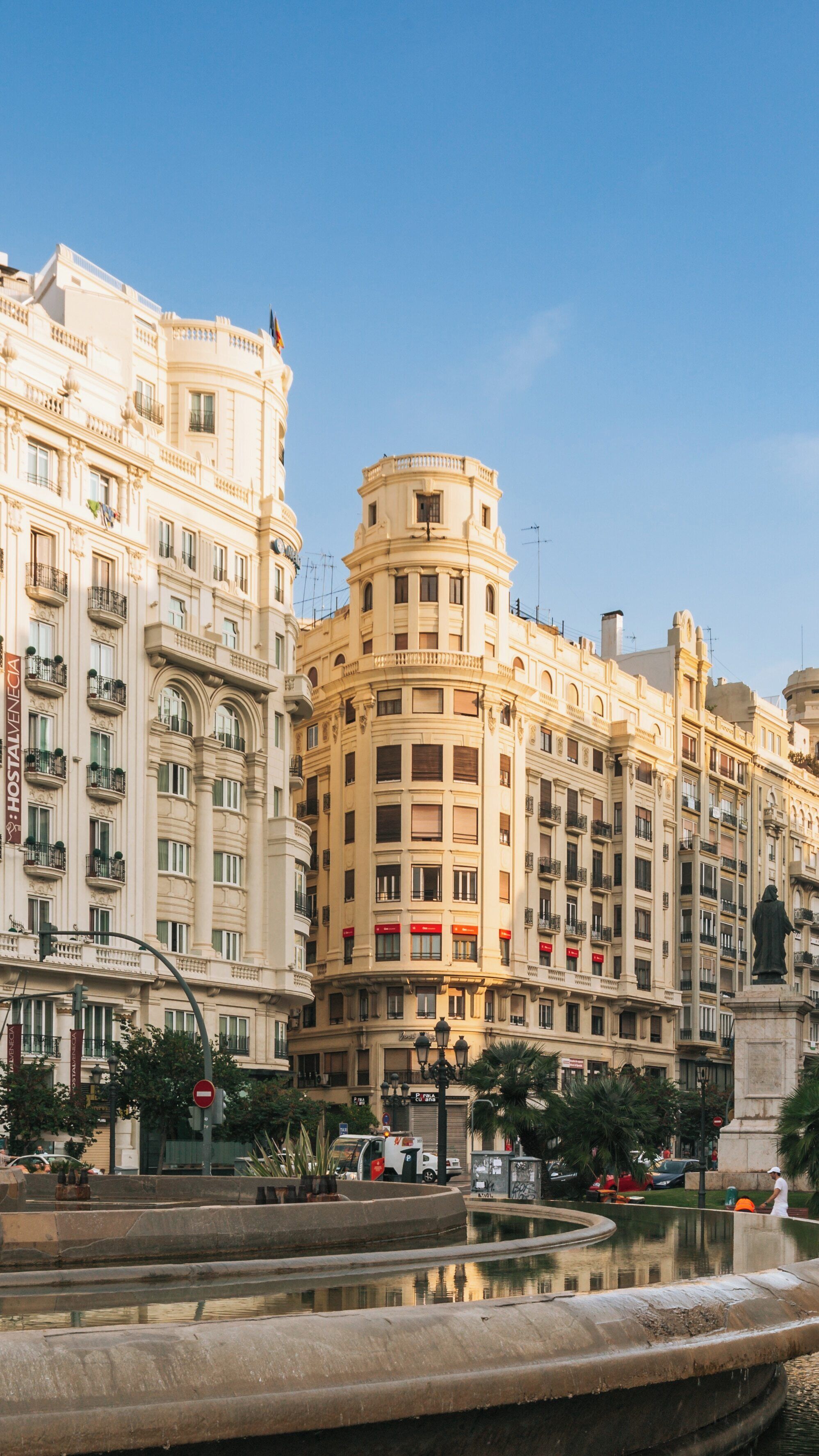 Elegant architecture and vibrant atmosphere of Plaza de la Reina in Valencia, showcasing the city's rich history and culture