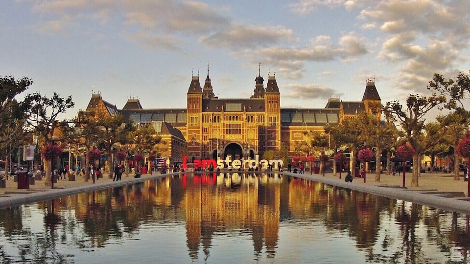 The Rijksmuseum is a Netherlands national museum dedicated to arts and history in Amsterdam. The museum is located at the Museum Square in the borough Amsterdam South, close to the Van Gogh Museum, the Stedelijk Museum Amsterdam, and the Concertgebouw. The museum has on display 8,000 objects of art and history, from their total collection of 1 million objects from the years 1200–2000, among which are some masterpieces by Rembrandt, Frans Hals, and Johannes Vermeer. The museum also has a small Asian collection which is on display in the Asian pavilion.