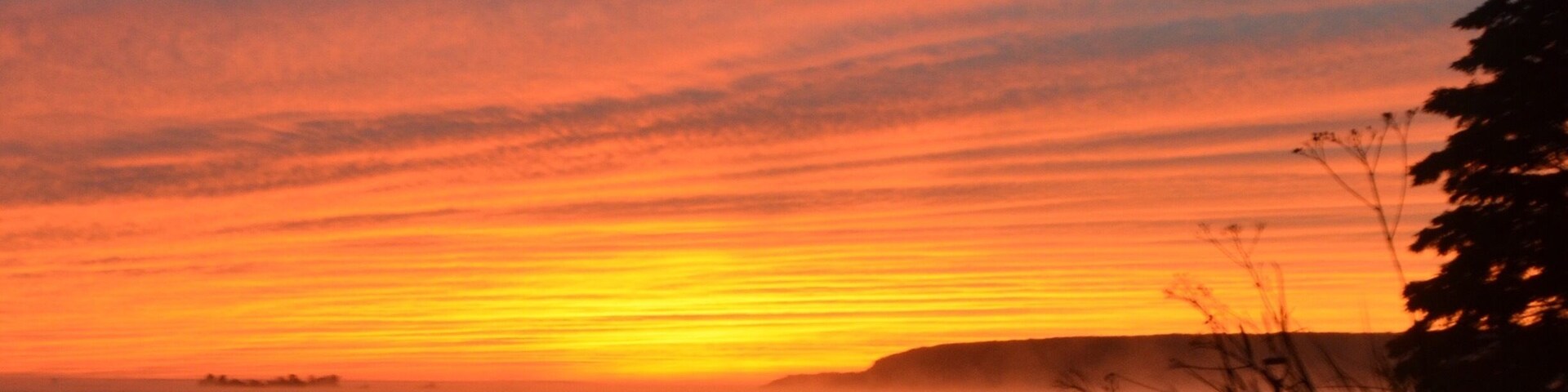 Sunset and mist from Sunnyside Beach.