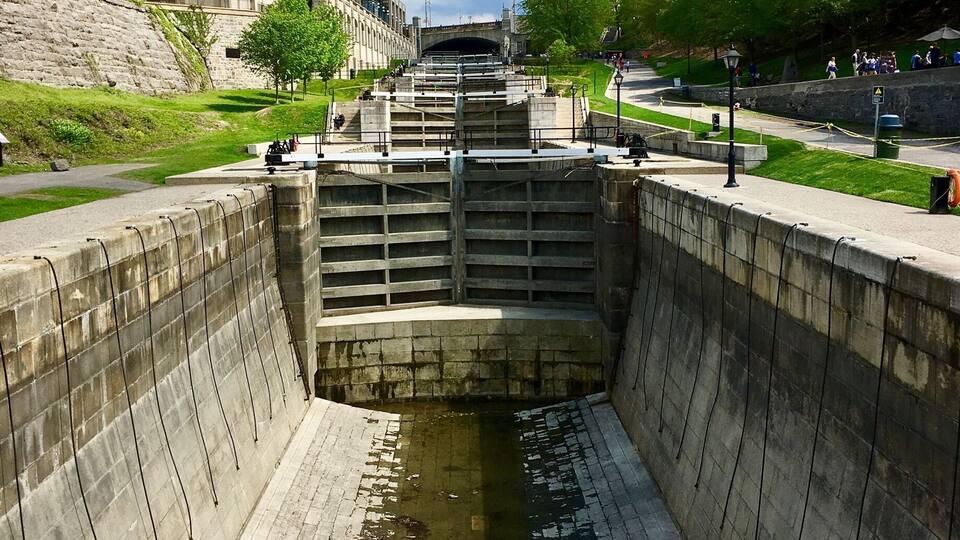 UNESCO World Heritage Site: Rideau Canal - Ottawa Lock, Ottawa, Canada
The Rideau Canal connects Ottawa on the Ottawa River to Kingston on Lake Ontario. It is 202 kilometres in length. The canal was opened in 1832 as a precaution in case of war with the United States. It remains in use today primarily for pleasure boating, with most of its original structures intact. It is the oldest continuously operated canal system in North America. (Wikipedia)
#UNESCOWorldHeritageSite #InStone #canal #Ottawa #Canada #Ontario #BVSblue #TroveOnTuesday #NorthAmerica #RideauCanal #lock #perspective #History Photo Contest