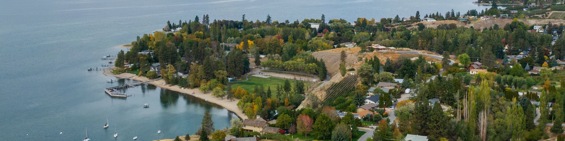 Penticton featuring landscape views, a lake or waterhole and a small town or village